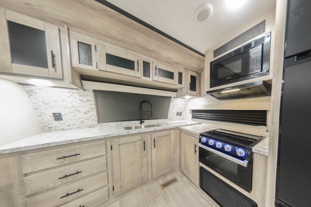15 Best Travel Trailers with Front Kitchens [2025 Edition]